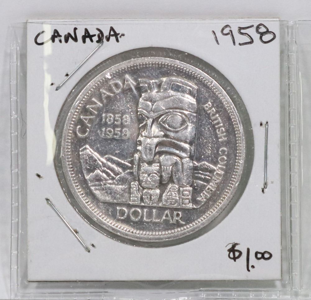 CANADIAN 1958 SILVER DOLLAR COIN.
