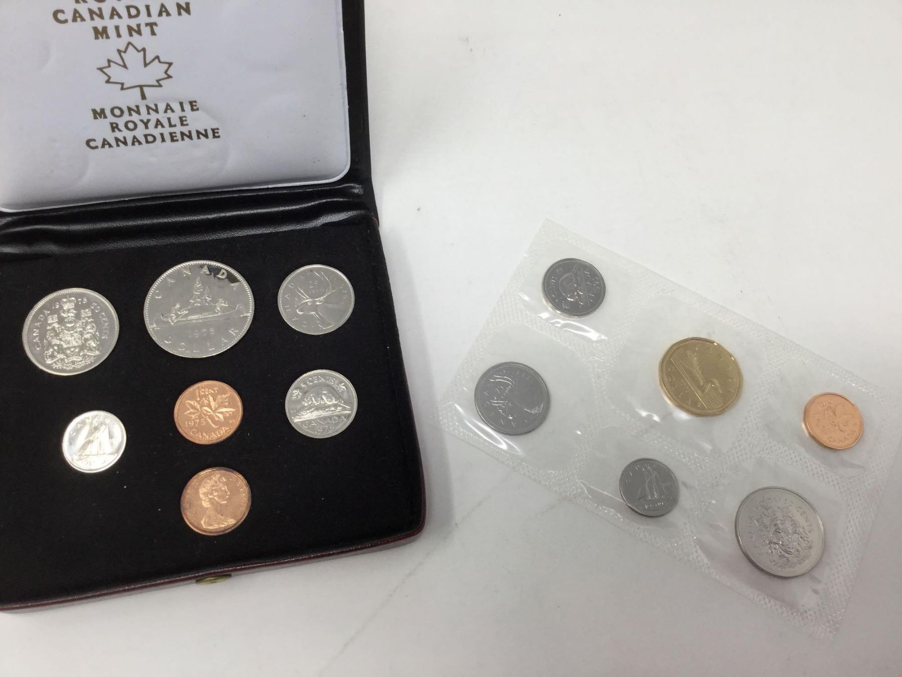 Lot of 2Royal Canadian Mint Coins Sets, 1975 1996