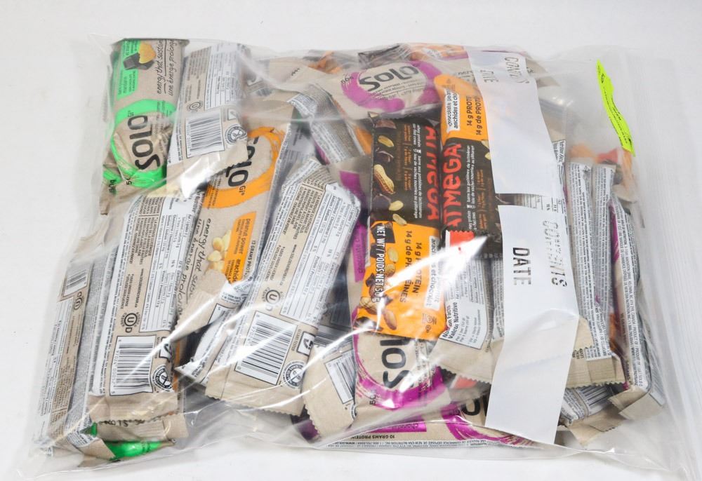 BAG OF ASSORTED PROTEIN BARS.
