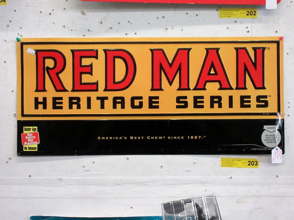 Red Man Tobacco Embossed Tin Sign