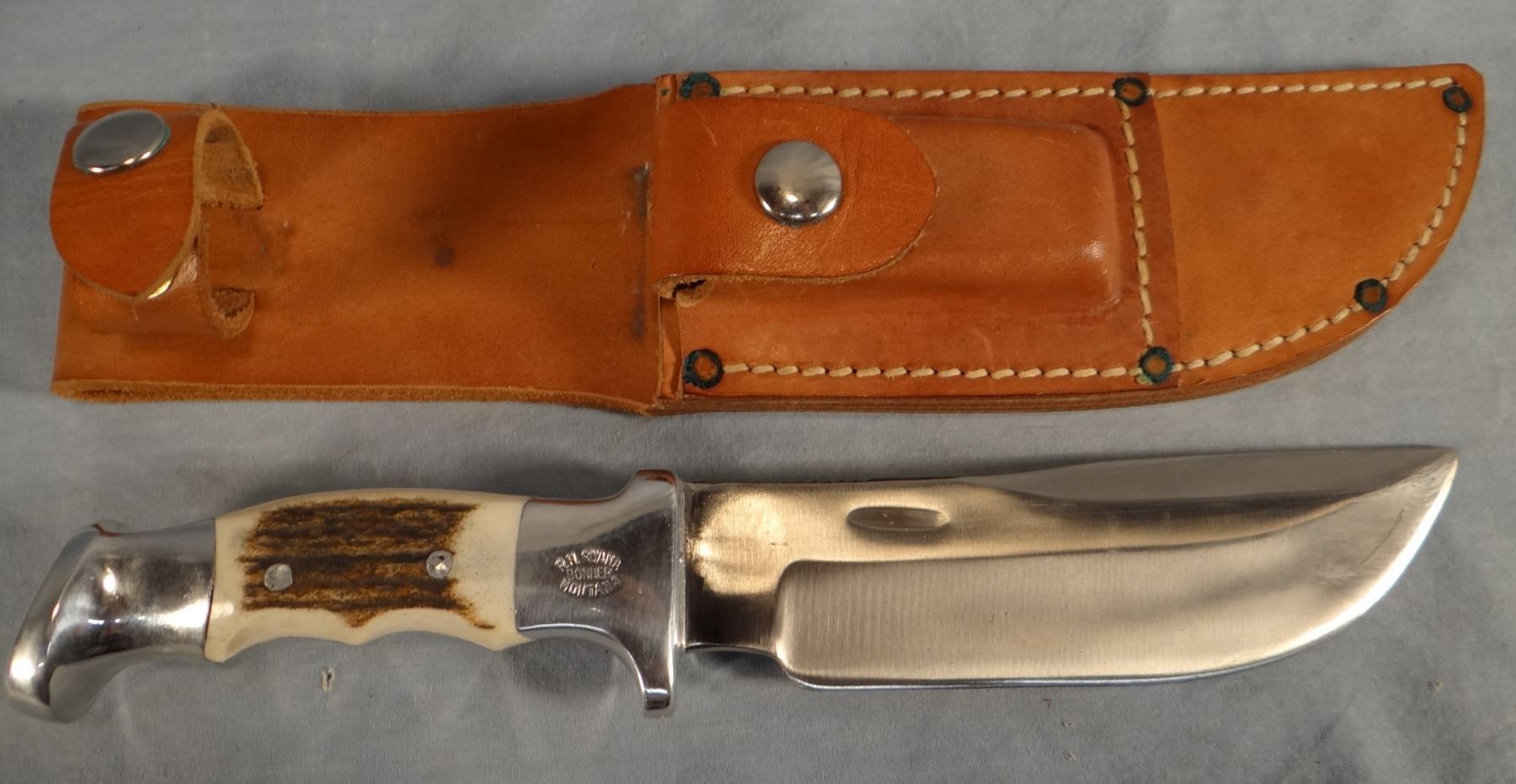 R. H. Ruana hunting knife, 6" skinner w/sheath and wet stone