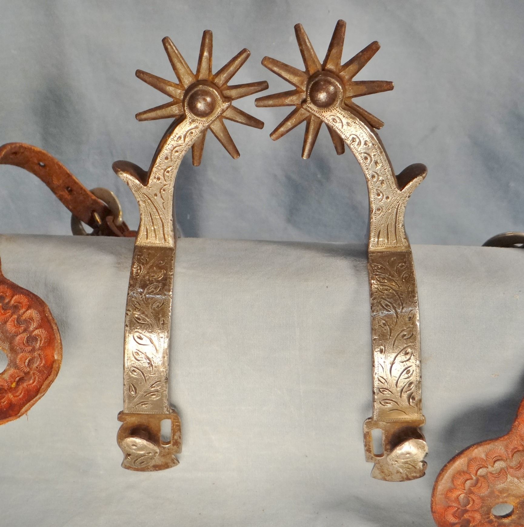 Full silver overlaid spurs with heart buttons, 10 pt rowels