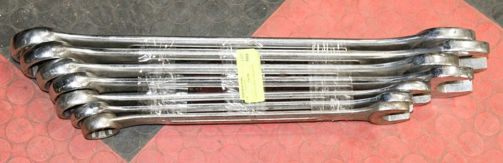 7 LARGE COMBO WRENCHES.
