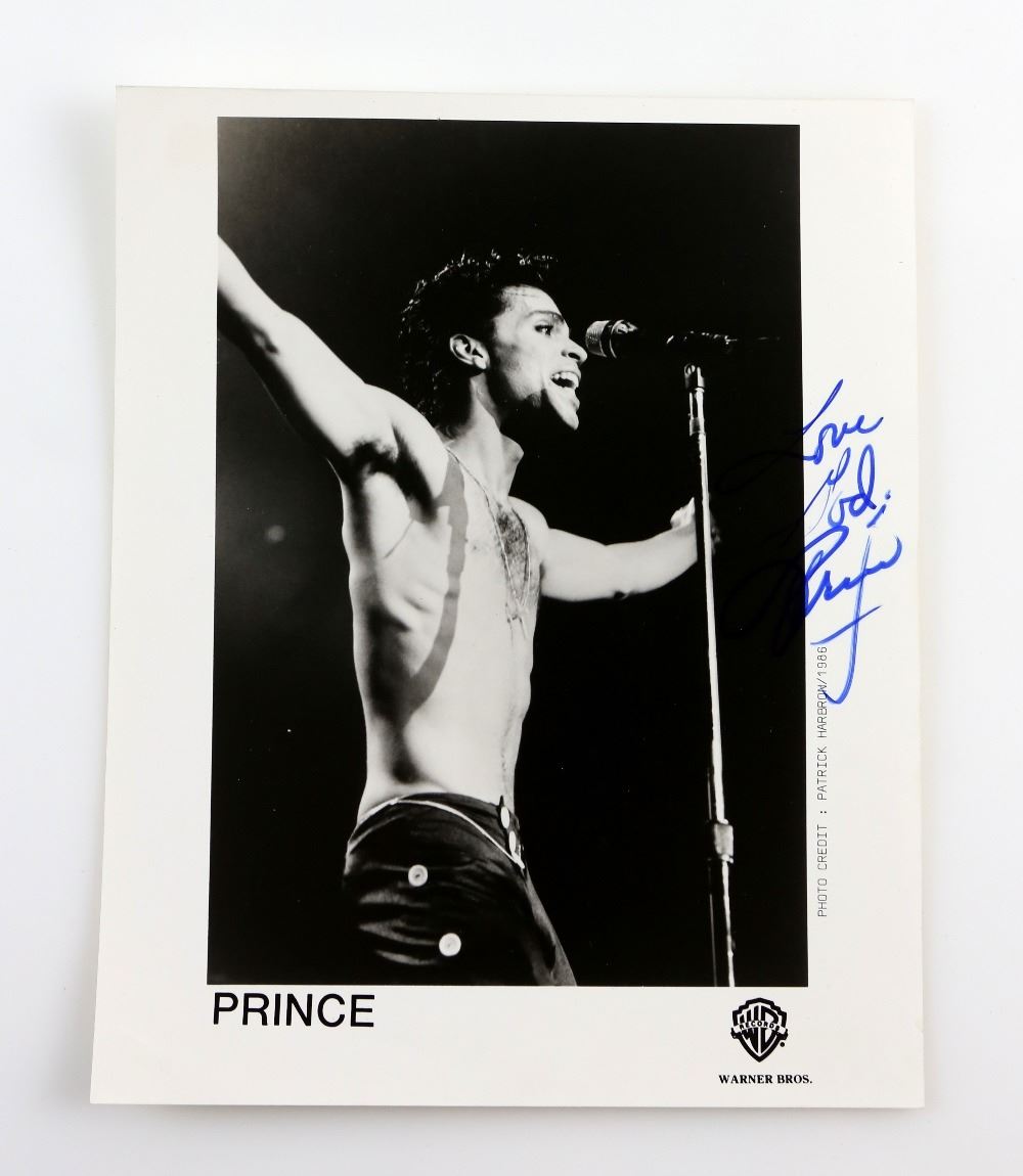 Prince Signed publicity photo 'Love God, Prince' in blue felt tip ...