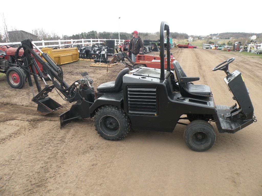 Tennant rubber tire backhoe