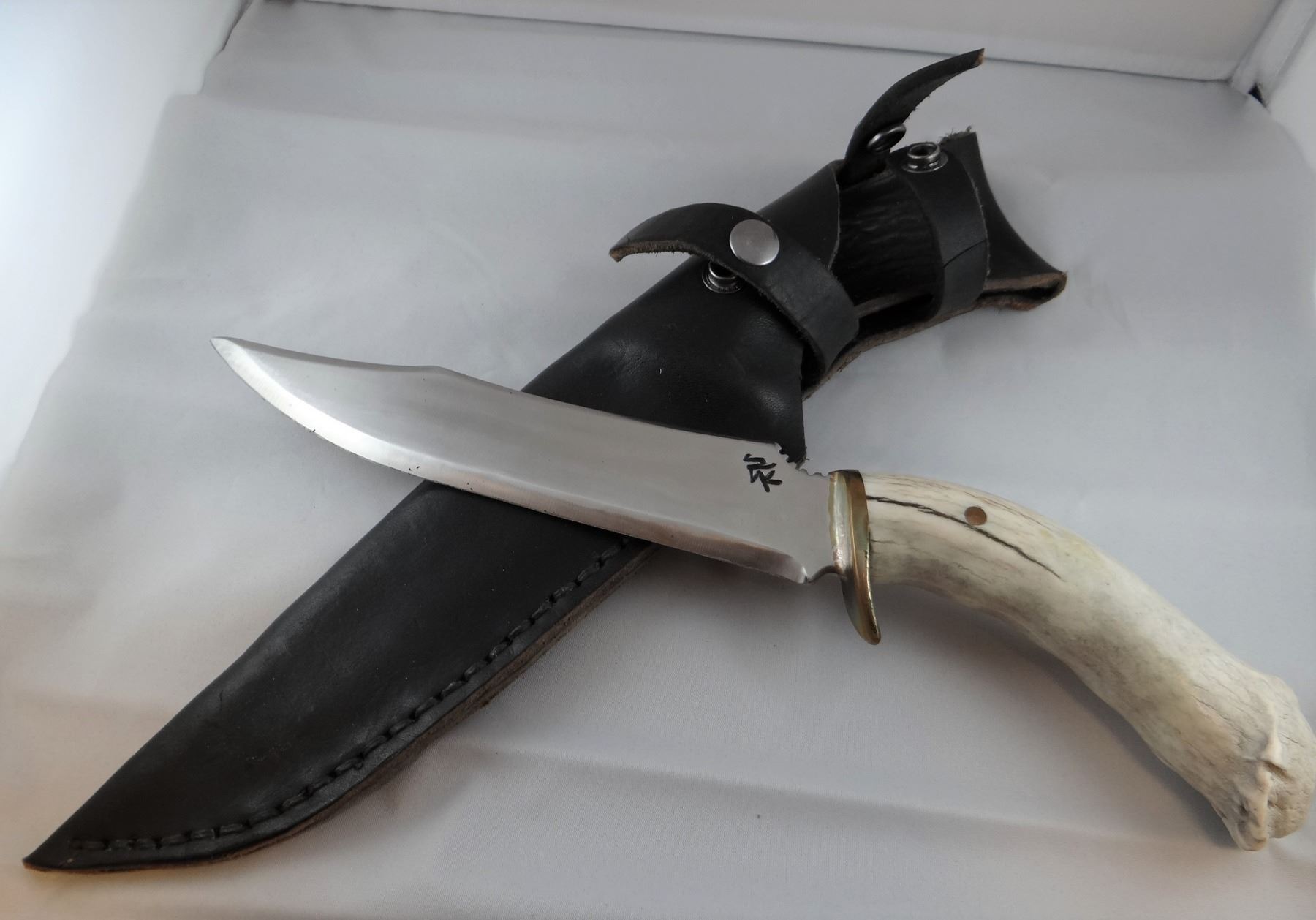 Running Wolf knife, antler handle, 8" blade with Buffalo Skull