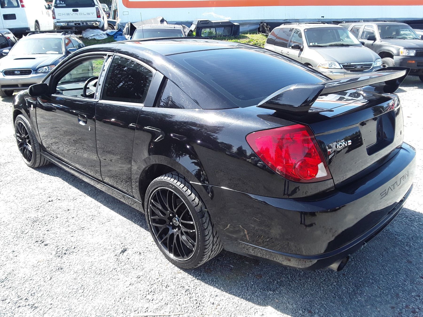 B1 -- 2005 SATURN ION REDLINE , Black , 105235 KM's