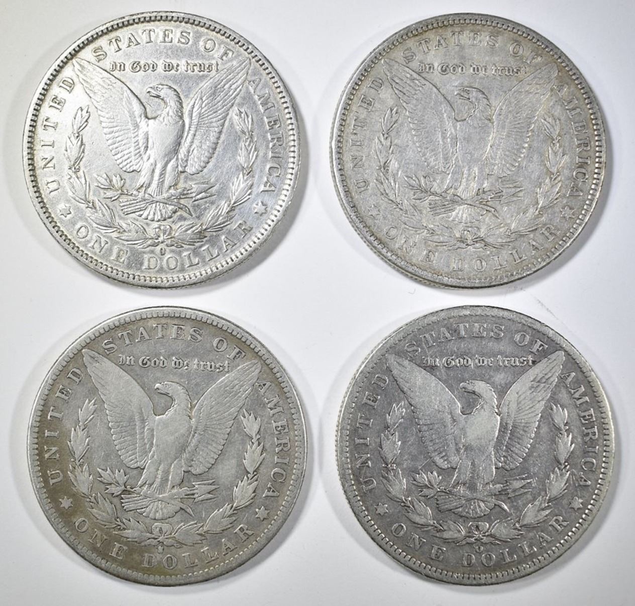 4 CIRC MORGAN DOLLARS 1882, 84-S, 87-O, 88-O.
