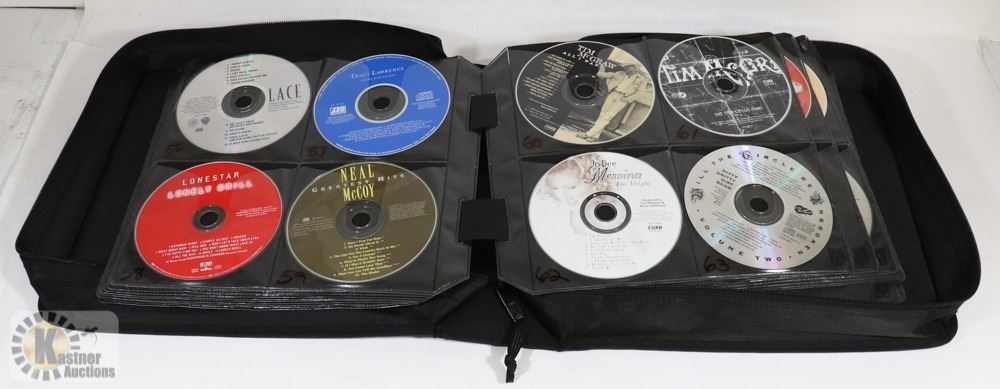 CD BINDER MOSTLY FULL OF CD'S