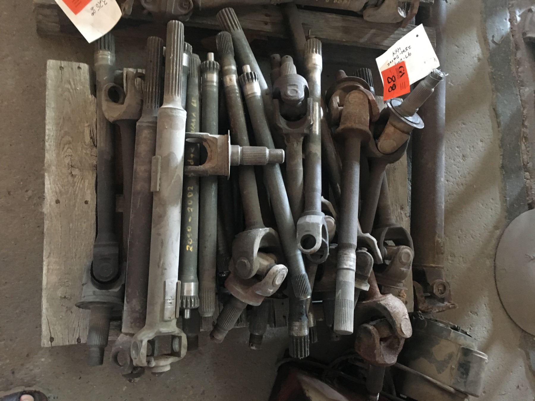 Pallet of used axles & drive shafts