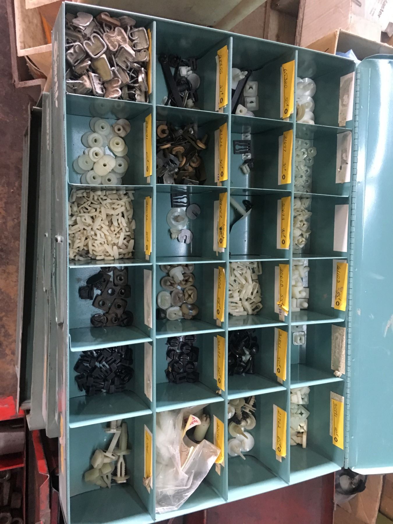 4 Curtis metal cases w/bumper bolts, lug nuts, clips, etc. plus 4 ...