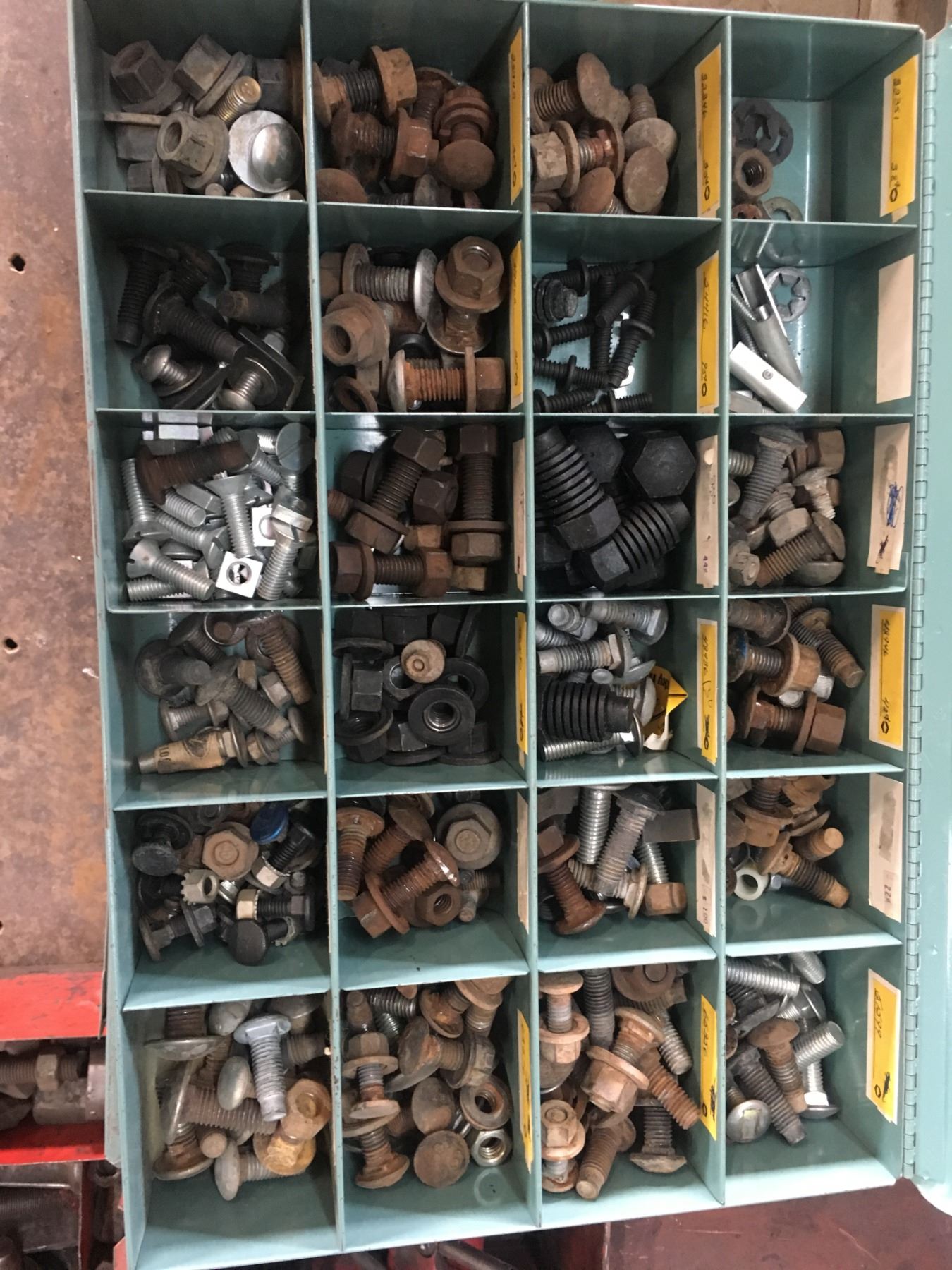 4 Curtis metal cases w/bumper bolts, lug nuts, clips, etc. plus 4 ...