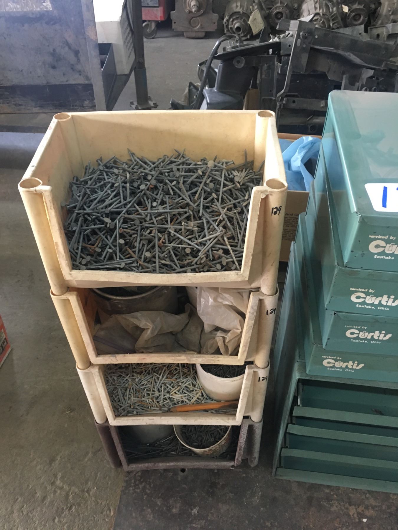 4 Curtis metal cases w/bumper bolts, lug nuts, clips, etc. plus 4 ...