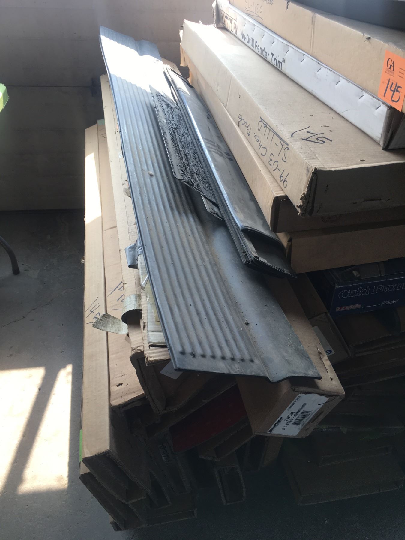 Asst'd fender trim kits & stainless side mouldings w/wheel well trim