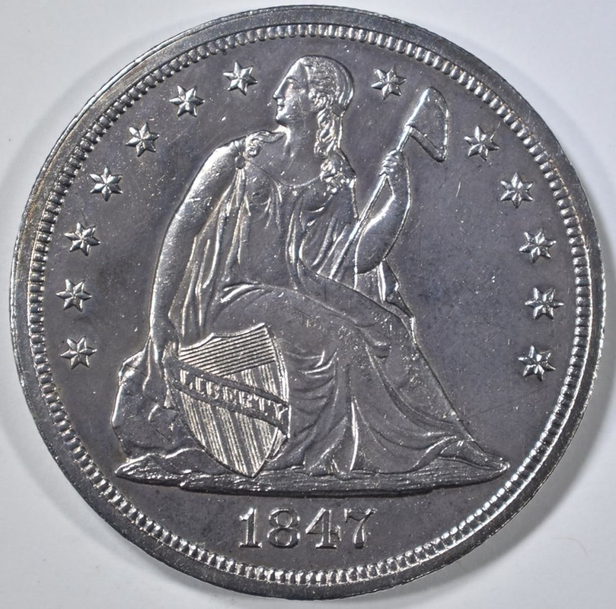 1847 SEATED DOLLAR BU