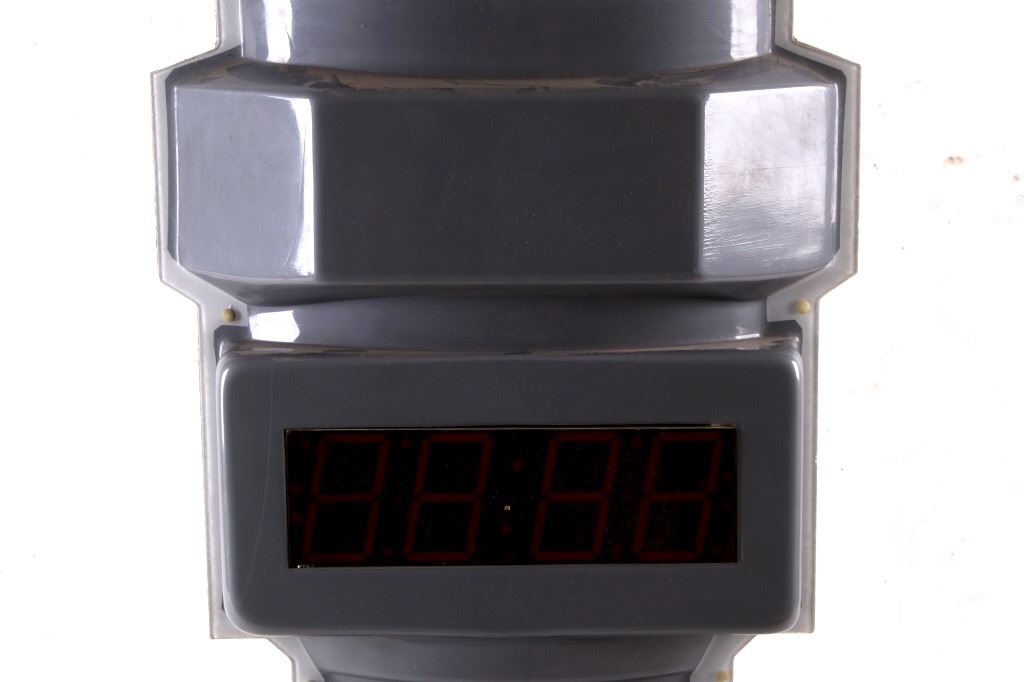 Dualite Inc. AC Sparkplug Union Label Clock