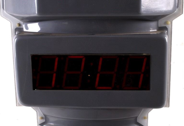 Dualite Inc. AC Sparkplug Union Label Clock