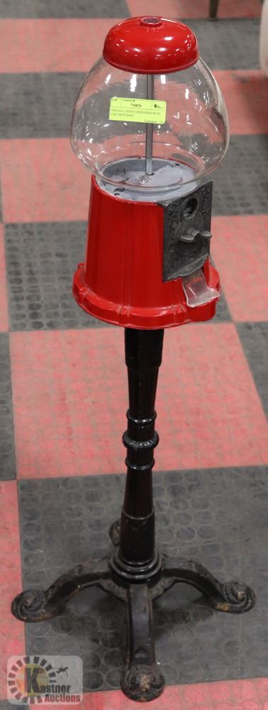 VINTAGE CANDY DISPENSER WITH CAST IRON BASE