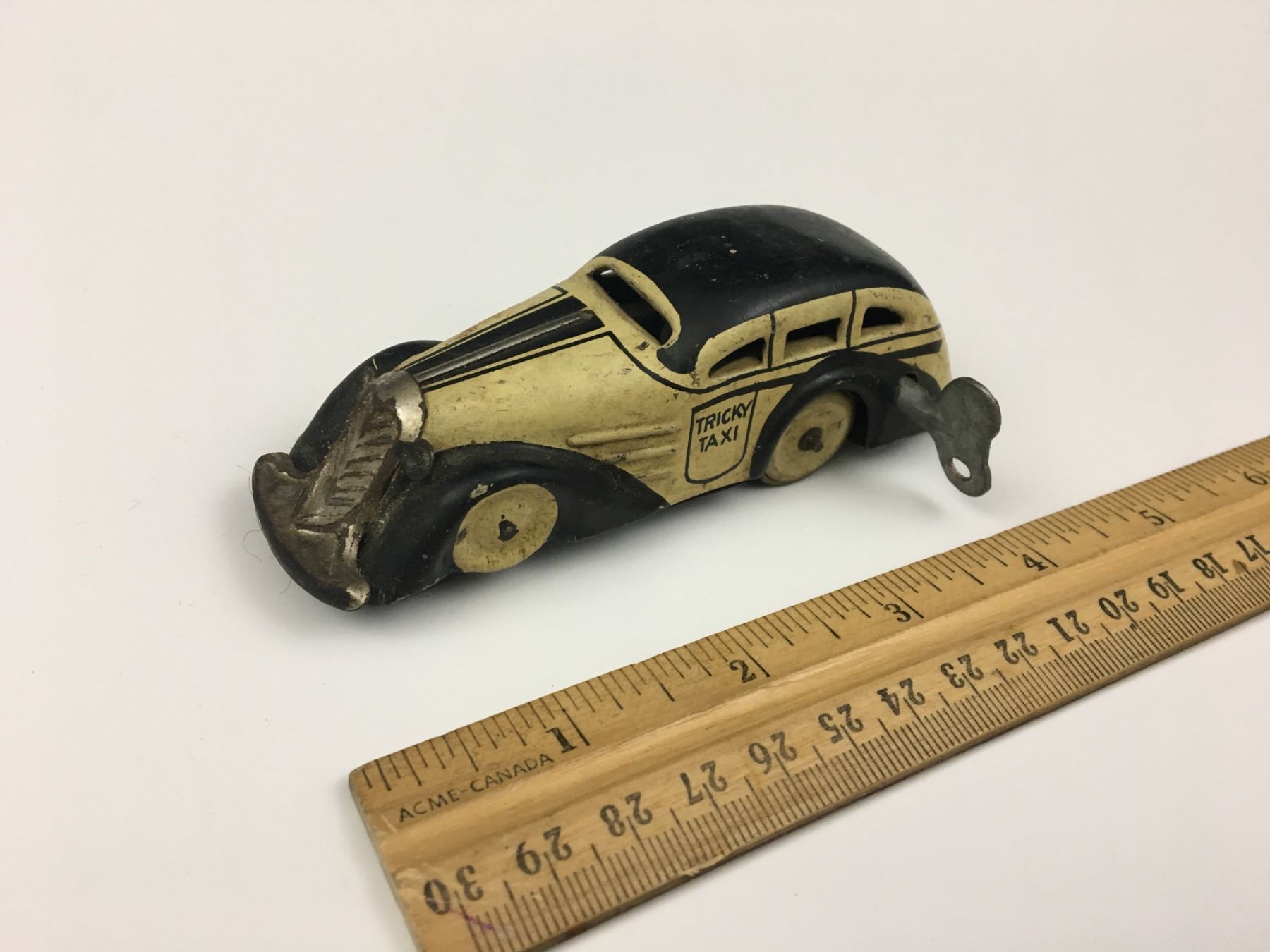KEYWIND TRICK TAXI TIN TOY CAR (1930'S) *MARX* - Schmalz Auctions