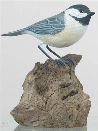 Lifesize chickadee carving ca 1980s on a burl mou