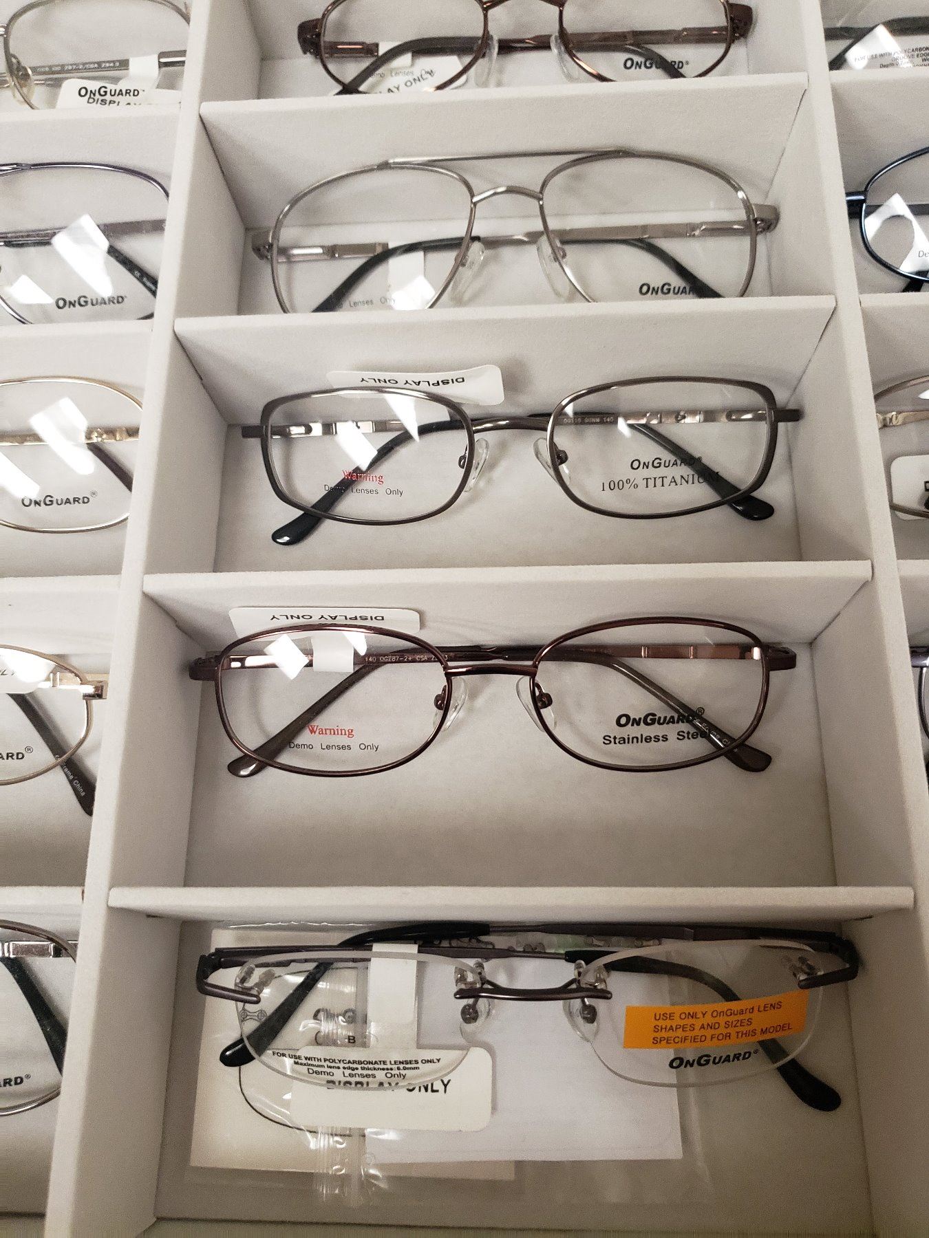 32 PAIRS OF SAMPLE GLASSES BY PROTEC EYEWEAR WITH CASE