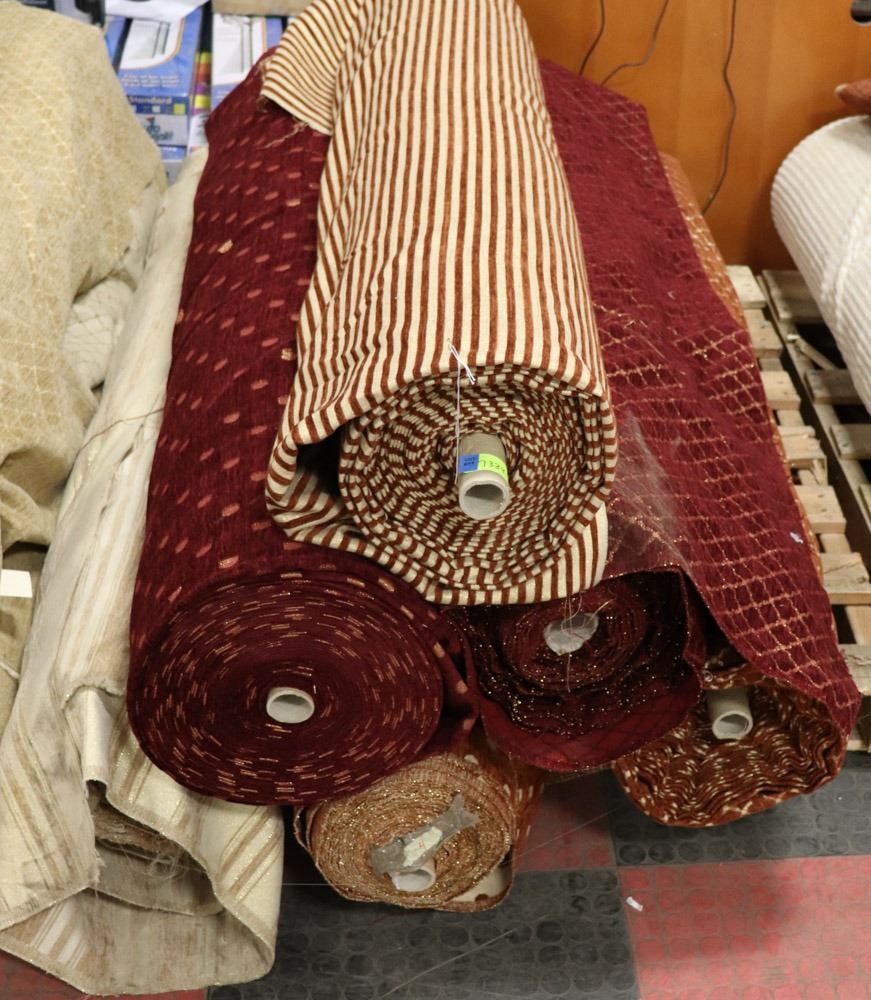 PALLET WIT 6 LARGE ROLLS OF ASSORTED FABRIC
