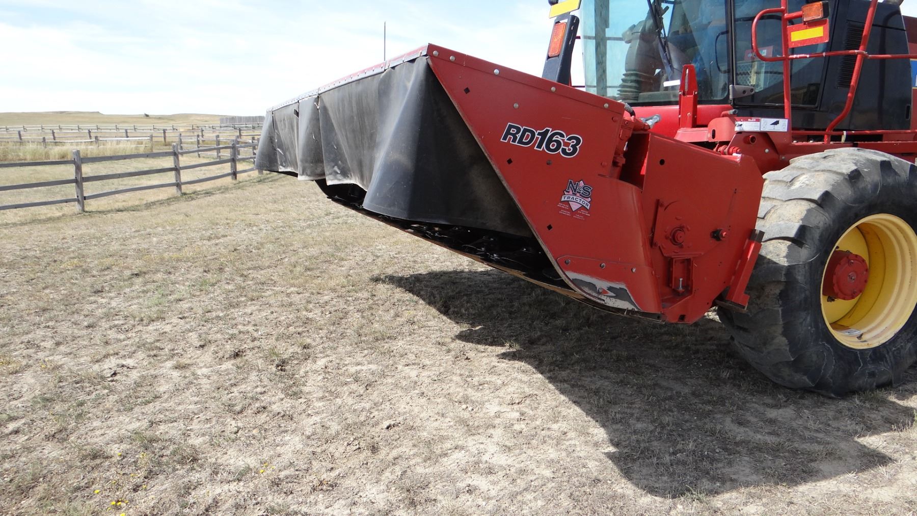 2009 New Holland H8080N rotary swather