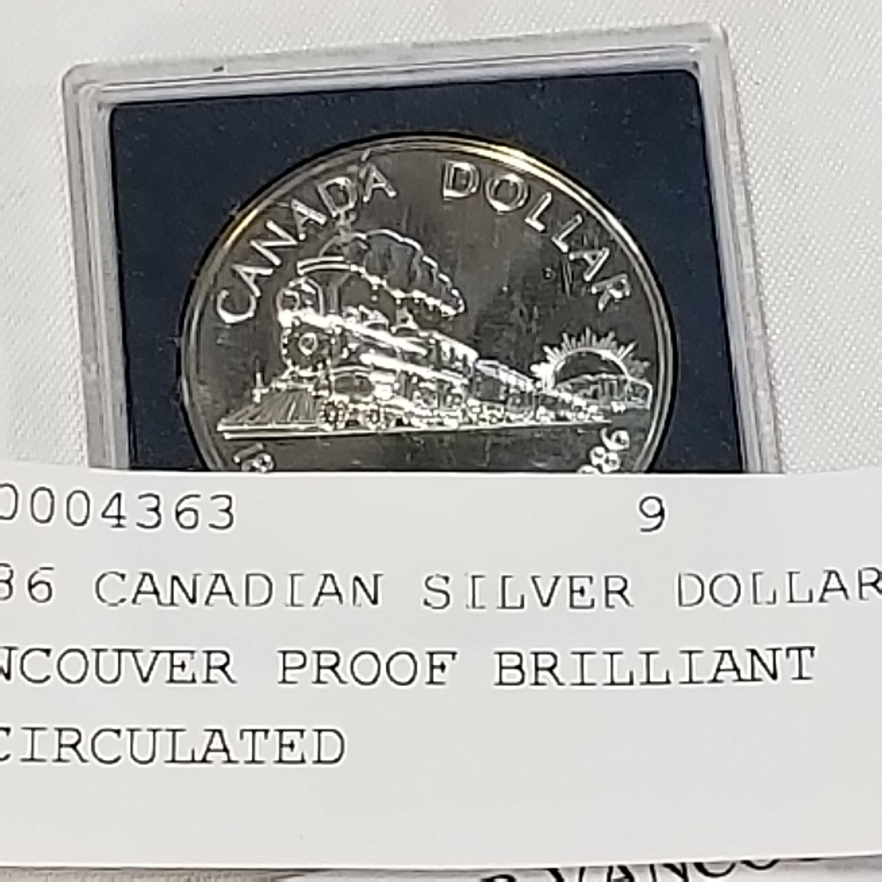 1986 CANADIAN SILVER DOLLAR VANCOUVER PROOF BRILLIANT UNCIRCULATED 1986-canadian-silver-dollar-vancouver-proof-brilliant-uncirculated
