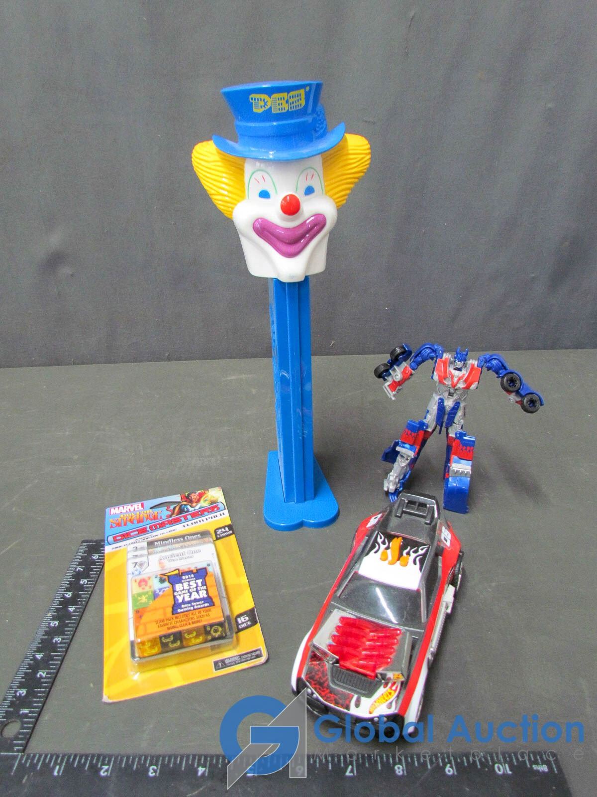 Large Clown Pezz Dispenser & (2) Transformer Toys