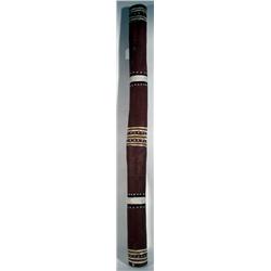 AN AUSTRALIAN ABORIGINAL SOUND TUBE (didgeridoo),