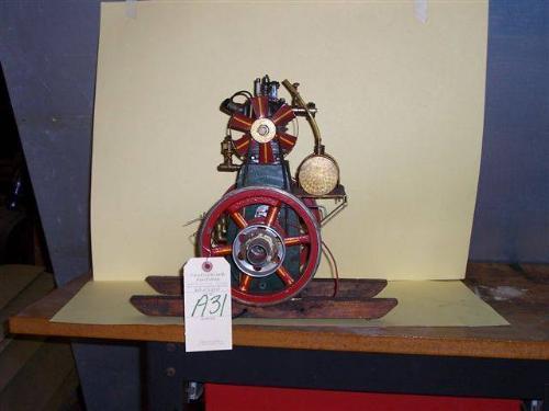 MINATURE HOMEMADE STATIONARY GAS ENGINE.