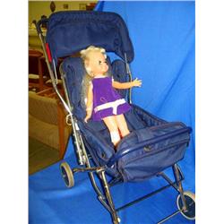 Folding navy blue doll stroller. (2) Look Around