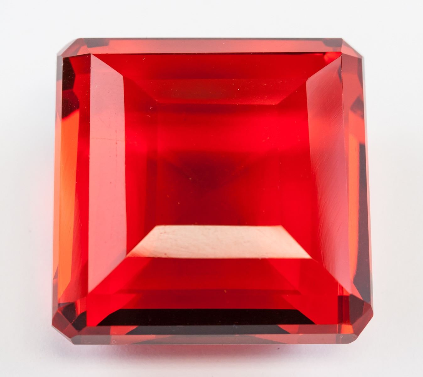 132.20ct Emerald Cut Red Topaz Gemstone GGL