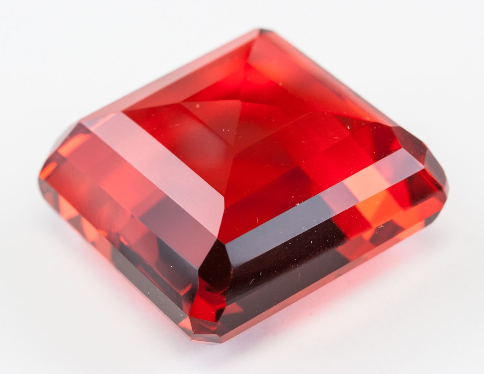 132.20ct Emerald Cut Red Topaz Gemstone GGL