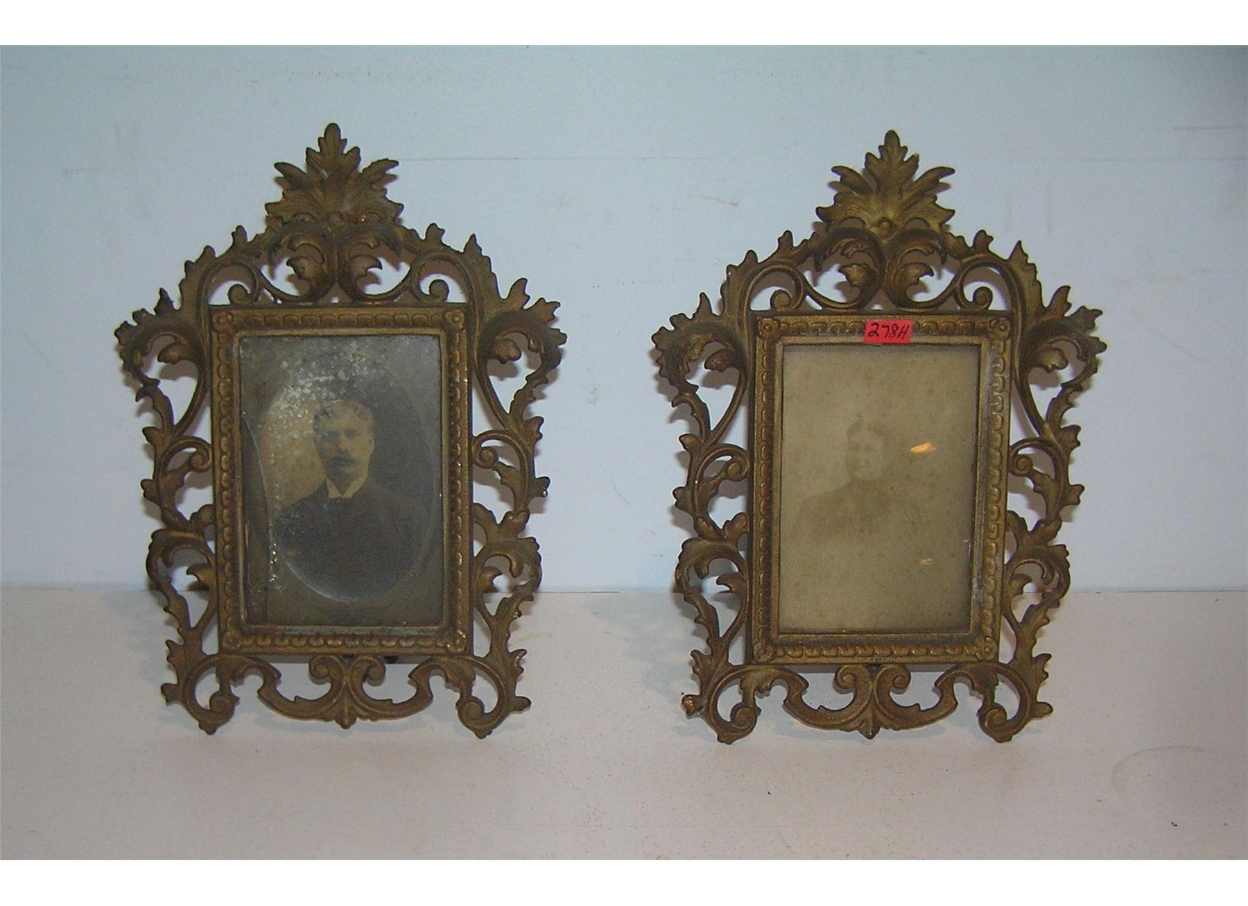 Antique bronze picture frames with antique photos