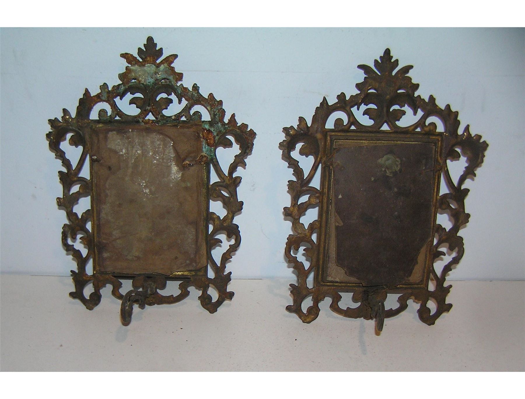 Antique bronze picture frames with antique photos