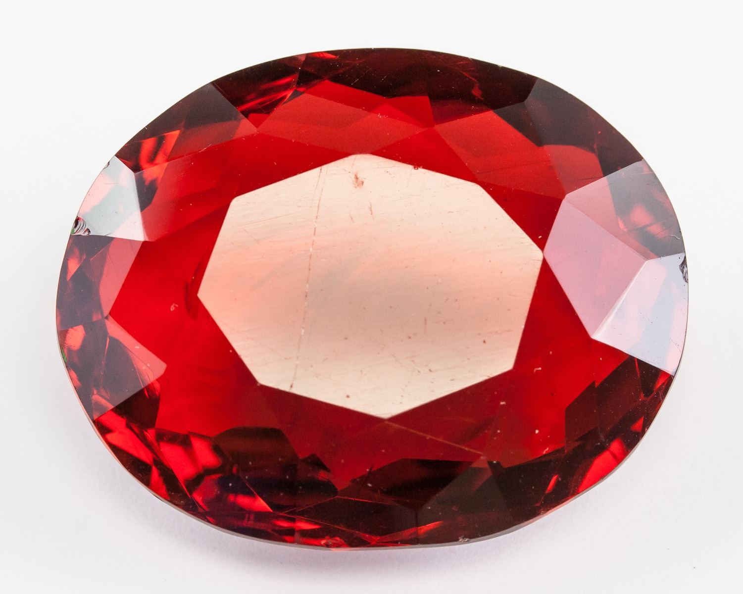68.15ct Oval Cut Red Topaz Gem GGL COA