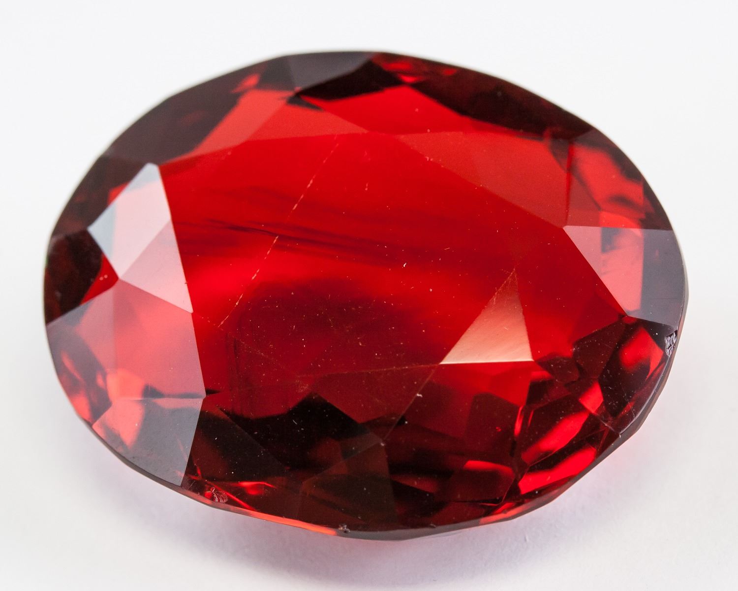 68.15ct Oval Cut Red Topaz Gem GGL COA