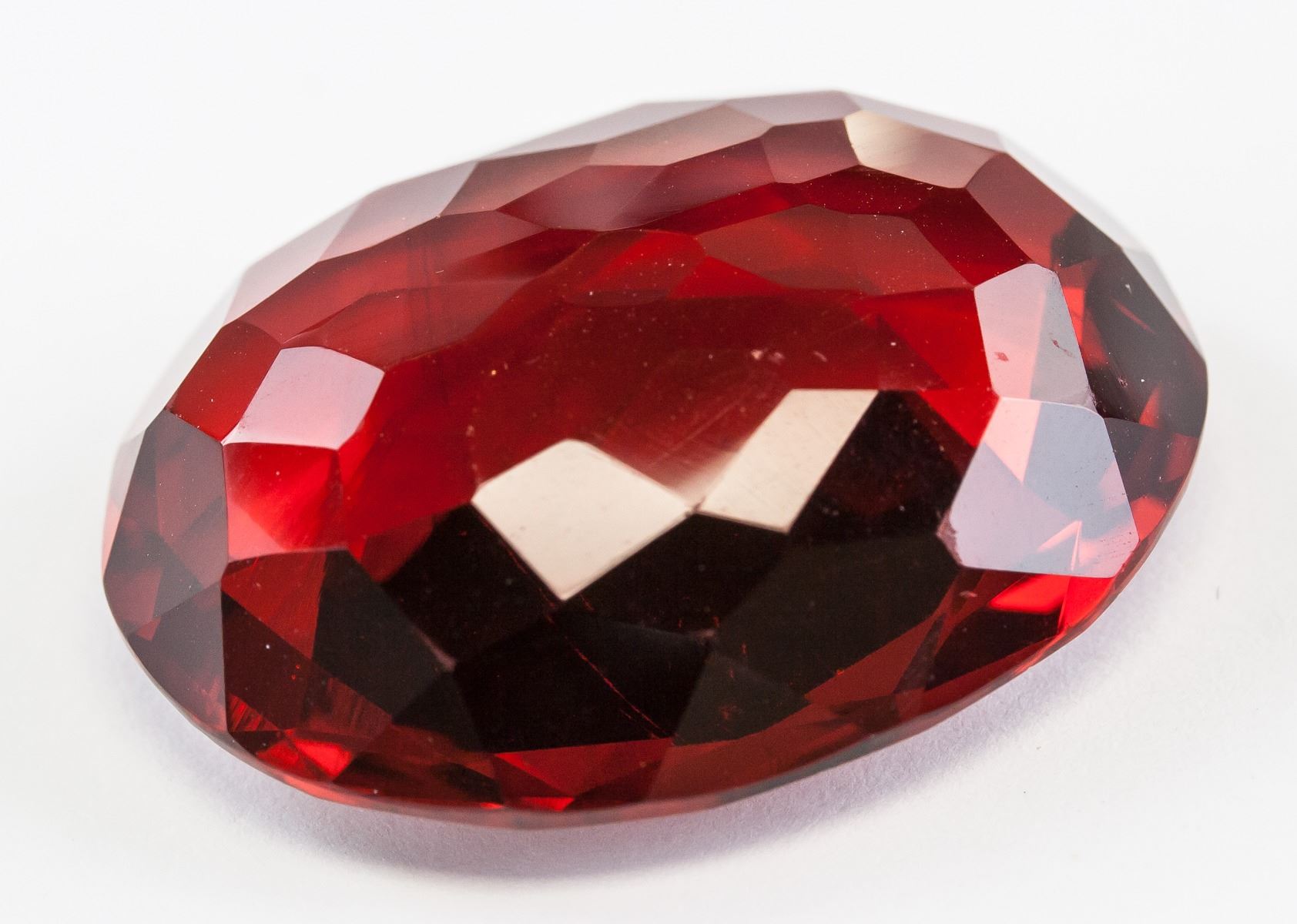 68.15ct Oval Cut Red Topaz Gem GGL COA