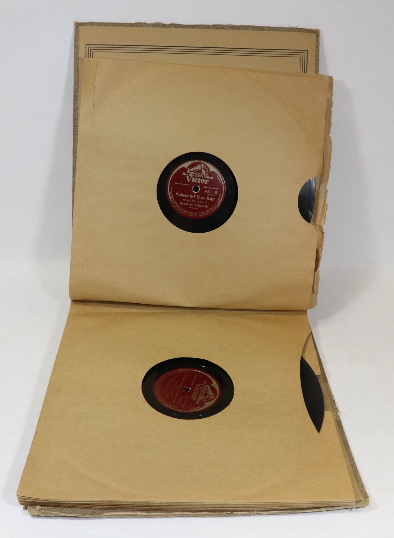 ALBUM OF 8 - 12 INCH PHONOGRAPH RECORDS