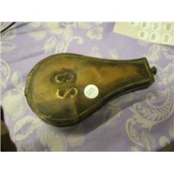 copper powder flask marked CS