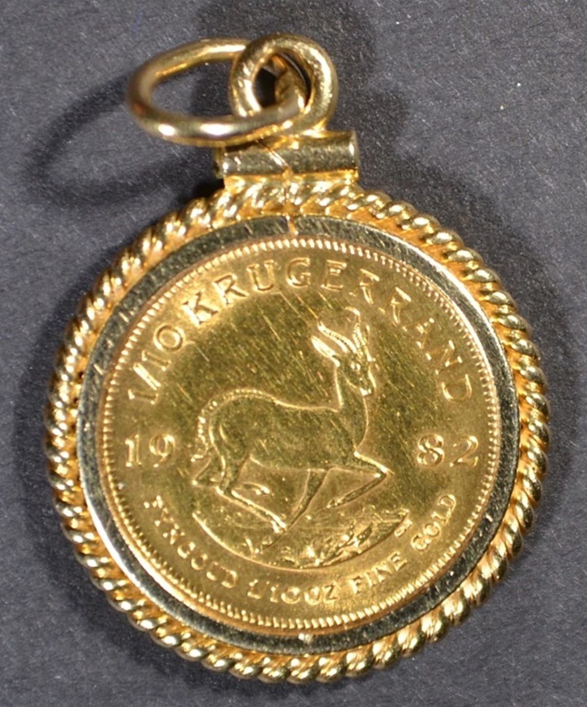 1982 1/10th OUNCE GOLD KRUGERRAND IN GOLD BEZEL