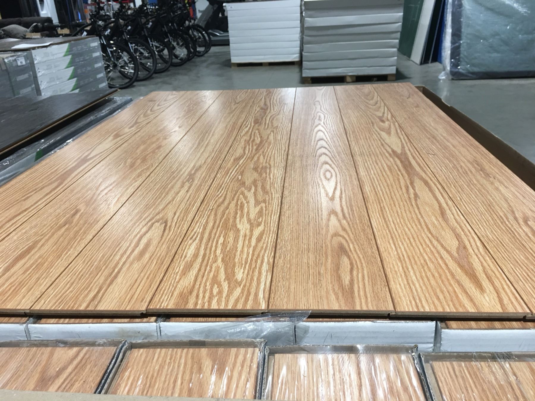 PALLET 49 BOXES OF UNIBOARD 5 X 12MM LAMINATE FLOORING REFINED OAK pallet-49-boxes-of-uniboard-5-x-12mm-laminate-flooring-refined-oak
