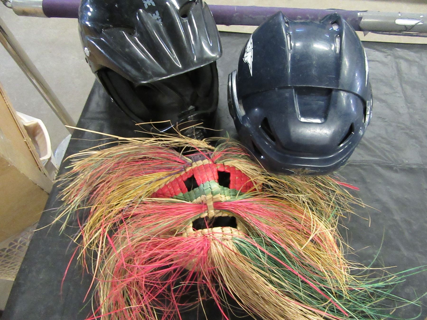 BOX WITH HELMETS, WICKER MASK, ETC