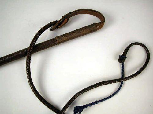 AN ANTLER HANDLED BRAIDED LEATHER RIDING CROP