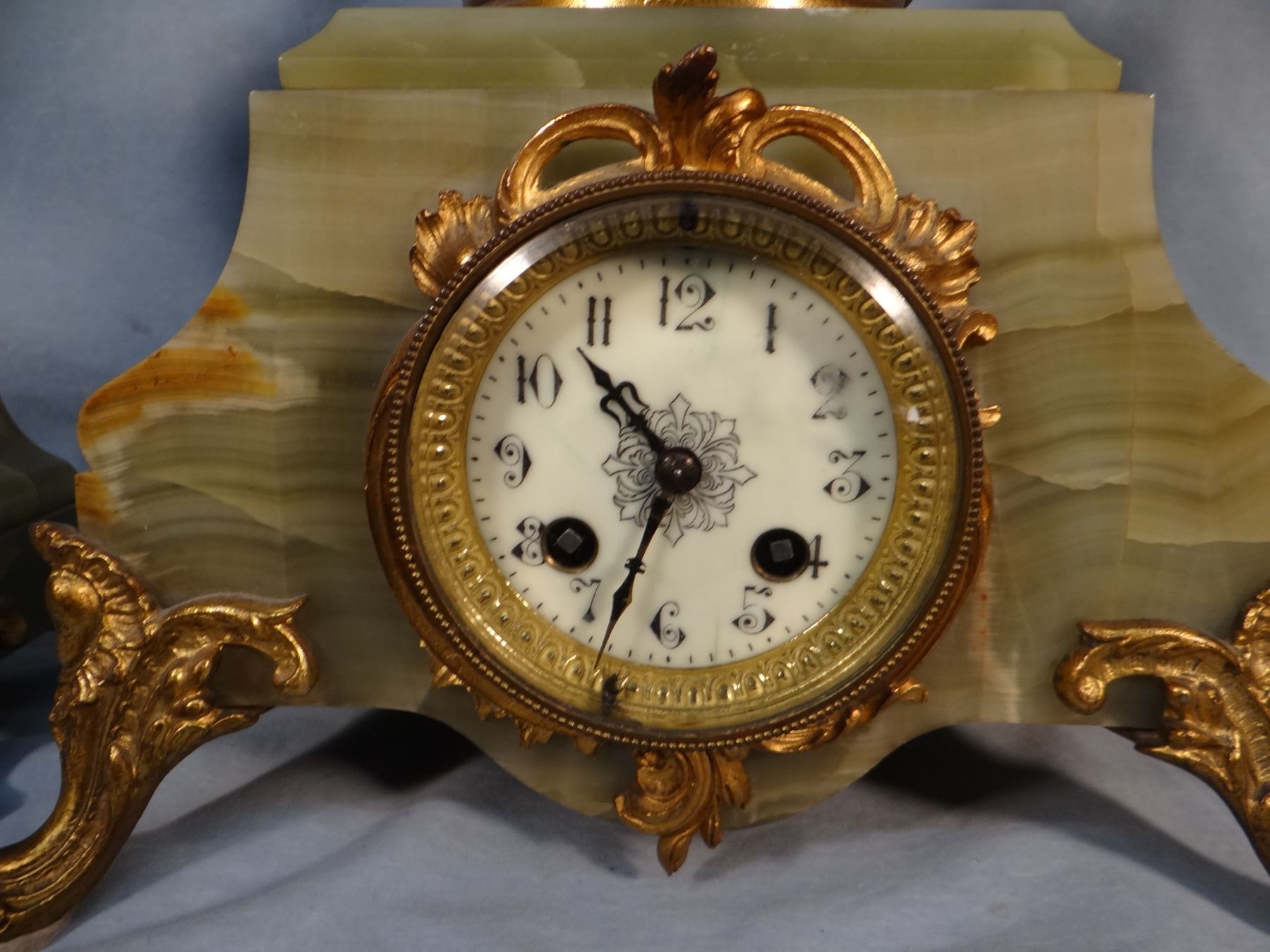 I Rousseau French ornate figural clock w/cupid and arrow, jadite base ...