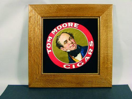 Tom Moore Cigars Sign on Black Glass