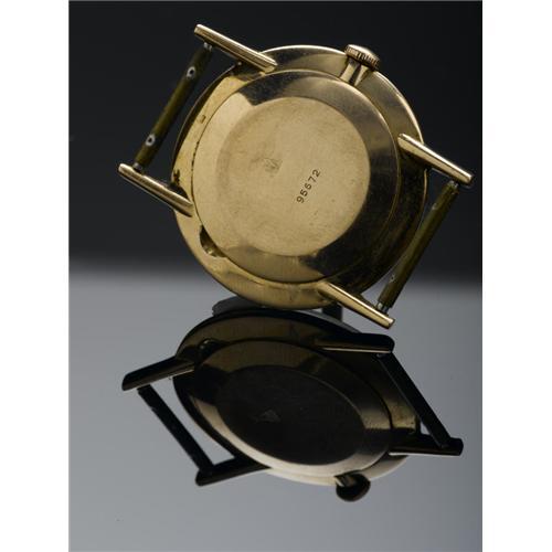 A GOLD WATCH CASE A GOLD WATCH CASE