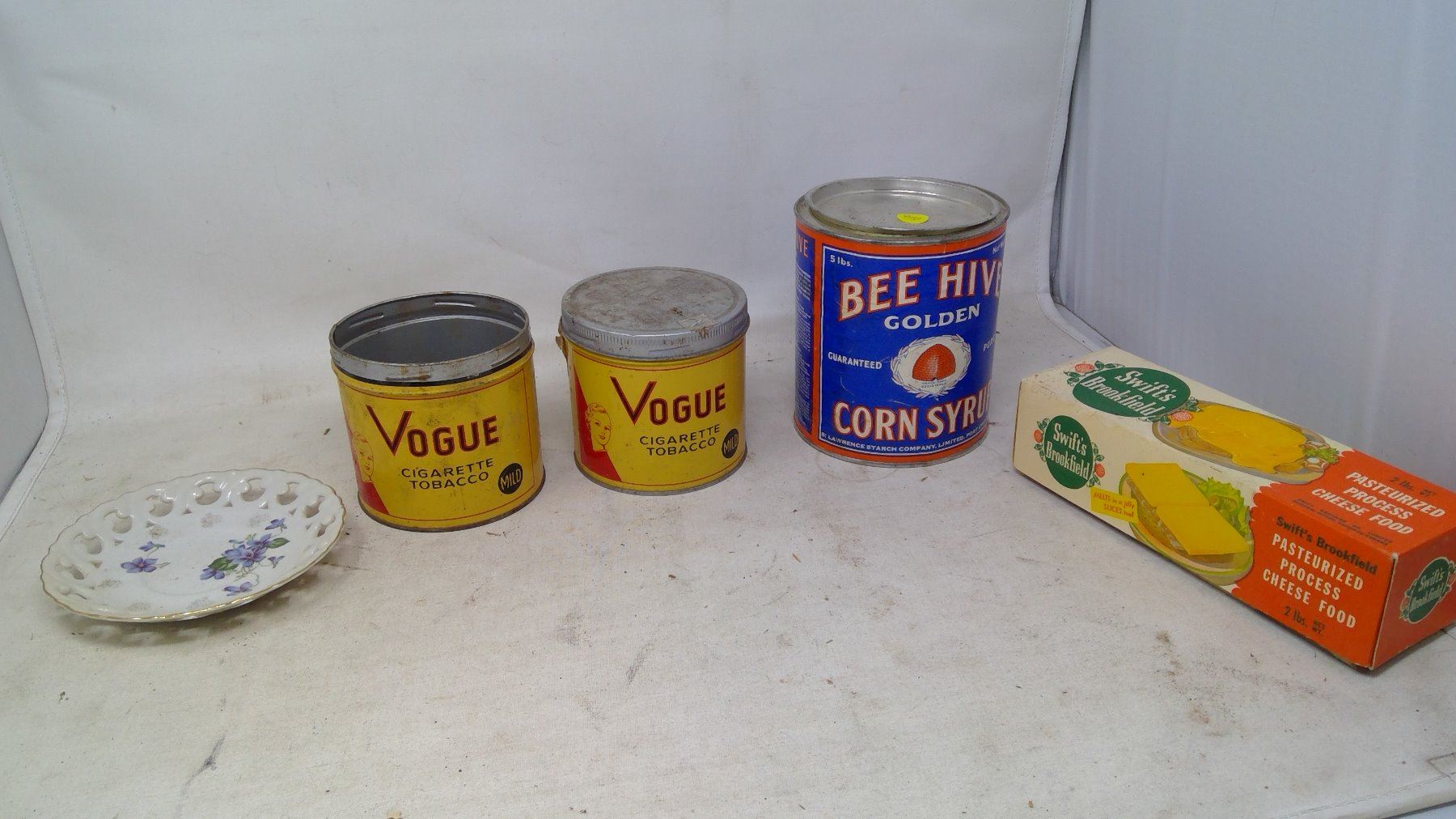 Tobacco, Behive, and Swift's cans