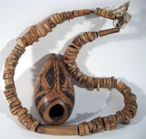 AN OLD WARIS PHALLOCRYPT AND BELT